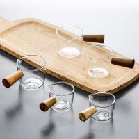 China Home Cooking Delicate Wooden Handle Glass Measuring Spoon for sale