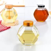 China 380ml Geometric Hexagon Glass Honey Jars With Metal Lid for sale