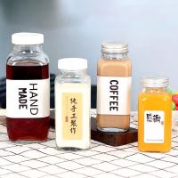 China Square Clear Glass Beverage Bottles 500ml Custom Label With Plastic Screw Lid for sale