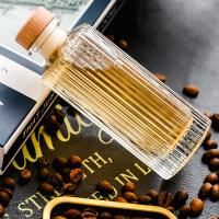 China 250ml Vertical Striped Glass Bottle With Wooden Cork Caps for sale