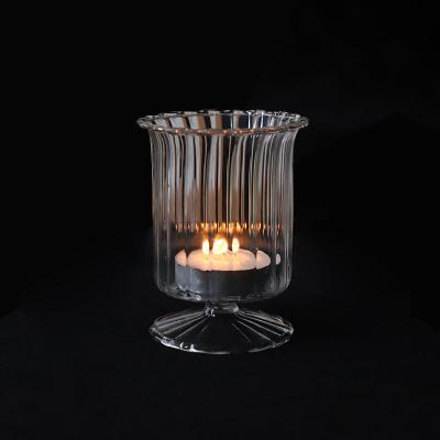 China LFGB Wedding Flower Shape Clear Glass Candlestick for sale