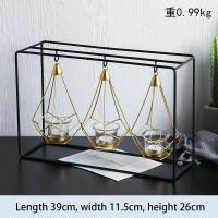 China Modern Minimalist Wind Cradle Hanging Candle Holders With Metal Frame for sale