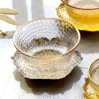 China Lotus Base Hammer Pattern Transparent Glass Tea Cups Gold Silver Color for sale