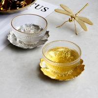 China Lotus Base Hammer Pattern Transparent Glass Tea Cups Gold Silver Color for sale