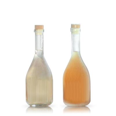China 500ml glass liquor bottle green plum wine bottle Sealed beverage bottle with lid​ for sale