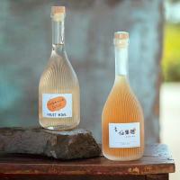 China 500ml glass liquor bottle green plum wine bottle Sealed beverage bottle with lid​ for sale