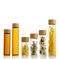 China Hot Sale Mini Bamboo Lid Glass Packaging Bottle Small Borosilicate Glass Bottle for sale
