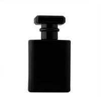 China 100ml Black White Colored Glass Spray Perfume Bottle  with Pump Sprayer for sale