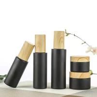 China 6ml Leakproof Cosmetic Glass Bottles Roller Ball Perfume Bottle With Bamboo Lid for sale