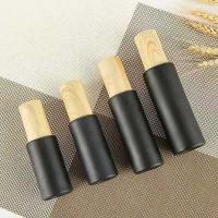 China 6ml Leakproof Cosmetic Glass Bottles Roller Ball Perfume Bottle With Bamboo Lid for sale