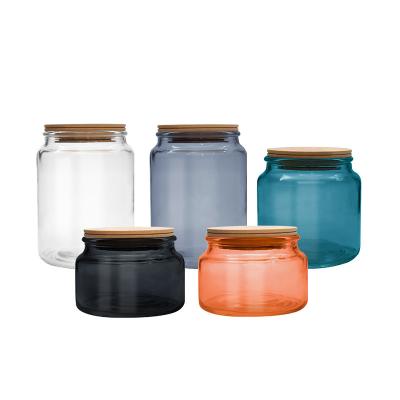 China 500ml 680ml High Borosilicate Glass Storage Jars With Bamboo Lid for sale