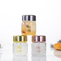 China 150ml 200ml Edible Glass Honey Jars Round Shape Custom Logo for sale