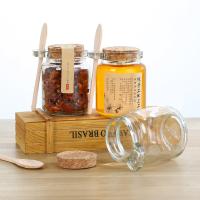 China Custom 250ml Glass Honey Jars Glass Pickle Jar With Wood Spoon for sale