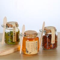 China Custom 250ml Glass Honey Jars Glass Pickle Jar With Wood Spoon for sale