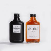 China Food Grade Classic Cold Brew Coffee Glass Bottles With Colour Spray for sale
