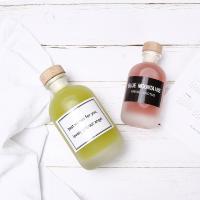 China Upper Liquor Frosted Empty Glass Wine Bottles 250ml 500ml With Cork Stopper for sale
