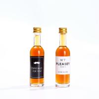 China 50ml Mini Glass Wine Bottles Whiskey Glass Bottles With Aluminum Lids for sale