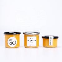 China Empty Wide Mouth Glass Storage Jars 30ml 50ml 100ml Glass Sauce Jar for sale