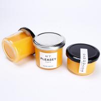China Empty Wide Mouth Glass Storage Jars 30ml 50ml 100ml Glass Sauce Jar for sale