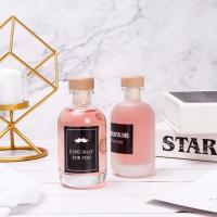 China Alcohol Liquor Frosted Empty Glass Wine Bottles 100ML 250ML for sale