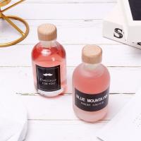 China Alcohol Liquor Frosted Empty Glass Wine Bottles 100ML 250ML for sale