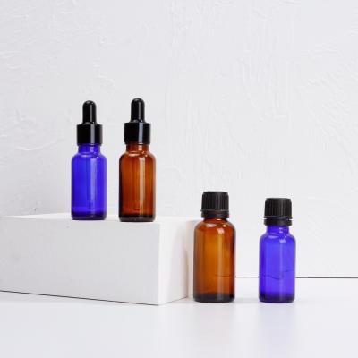 China Essential Oil Cosmetic Glass Bottles 5ml 15ml With Dropper for sale