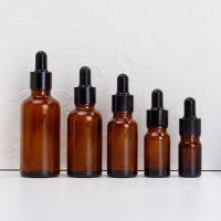 China Essential Oil Cosmetic Glass Bottles 5ml 15ml With Dropper for sale