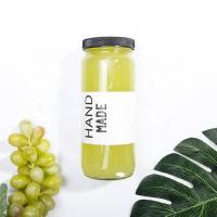 China 500ml 16oz Glass Drink Bottles Round Empty Packaging Juice Bottles for sale