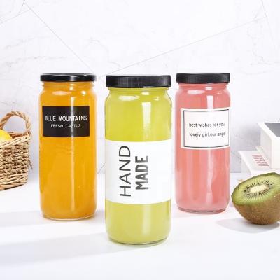 China 500ml 16oz Glass Drink Bottles Round Empty Packaging Juice Bottles for sale