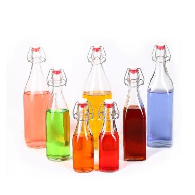 China 1000ml Glass Drink Bottles Coffee Juice Swing Top Glass Bottles for sale