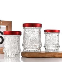 China Empty Lotus Shaped Glass Honey Jars Eco Friendly With Screw Lid for sale