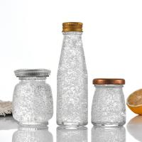China Empty Lotus Shaped Glass Honey Jars Eco Friendly With Screw Lid for sale
