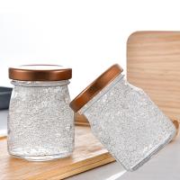 China Empty Lotus Shaped Glass Honey Jars Eco Friendly With Screw Lid for sale