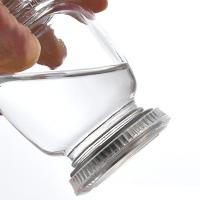 China Empty Lotus Shaped Glass Honey Jars Eco Friendly With Screw Lid for sale