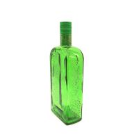 China 750ml Luxury Green Flat Empty Glass Wine Bottles With Screw Lid for sale