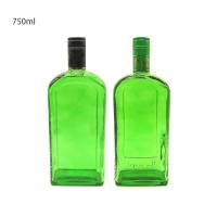 China 750ml Luxury Green Flat Empty Glass Wine Bottles With Screw Lid for sale