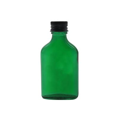 China Flat Dark Green 50ml Cosmetic Glass Bottles Screw Cap Essential Oil Glass Bottle for sale