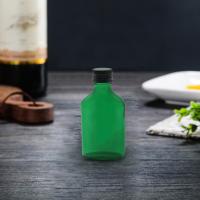 China Flat Dark Green 50ml Cosmetic Glass Bottles Screw Cap Essential Oil Glass Bottle for sale