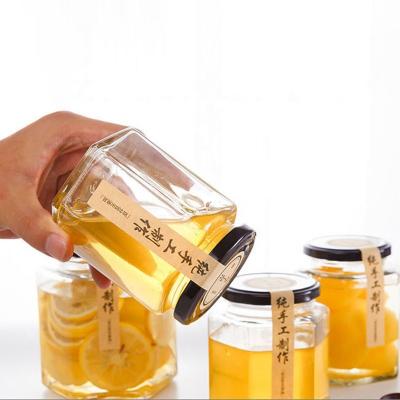 China Eco Friendly Glass Pickle Jar 280ml 500ml Empty Hexagon Honey Jar for sale