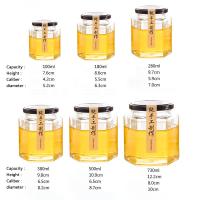 China Eco Friendly Glass Pickle Jar 280ml 500ml Empty Hexagon Honey Jar for sale