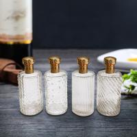 China Embossed Electroplated Glass Whiskey Bottle 15cm Height for sale