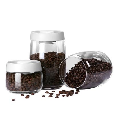 China 400ml Food Glass Storage Jars Vacuum Sealer Kitchen Storage Jars With Press Lid for sale