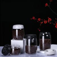 China 400ml Food Glass Storage Jars Vacuum Sealer Kitchen Storage Jars With Press Lid for sale