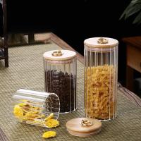 China 750ml 1000ml Borosilicate Glass Storage Jars With Bamboo Wooden Lids for sale