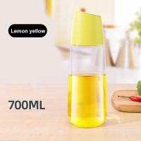 China 700ml Automatic Opening Olive Oil Glass Bottles Transparent Color for sale