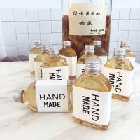 China Flat Square Glass Beverage Bottles 100ml 350ml With Silk Screen Printing for sale