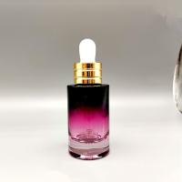 China Shockproof Cosmetic Glass Bottles Hot Stamping Face Cream Glass Bottle for sale