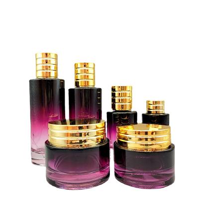 China Shockproof Cosmetic Glass Bottles Hot Stamping Face Cream Glass Bottle for sale