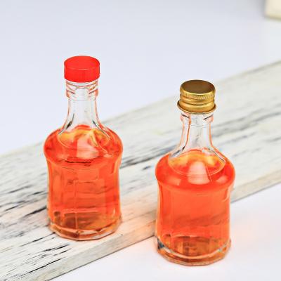 China Carton Packing Empty Round 50ml Wine Bottle With Screw Cap for sale