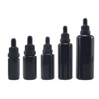 China 10ml 30ml Cosmetic Black Glass Dropper Bottle With Screw Cap for sale